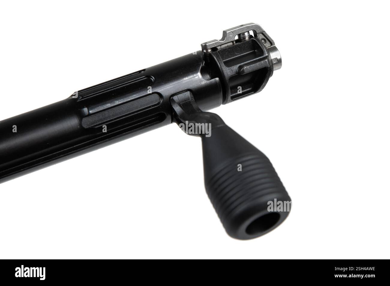 A close-up of a bolt action rifle bolt featuring a textured rubber grip ...