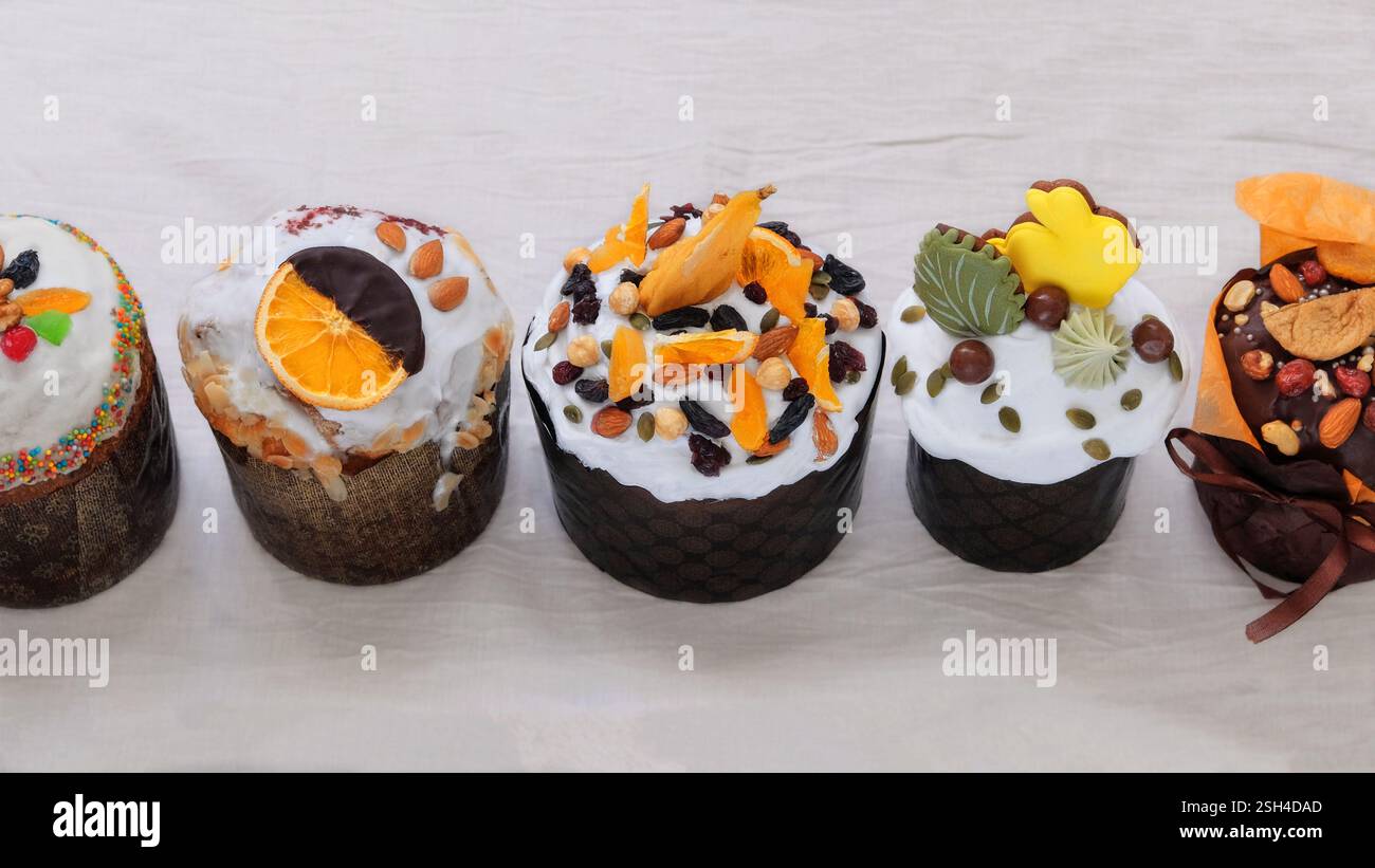 Easter traditions. Easter cakes on a table. Variety of Panettone. Sweet ...