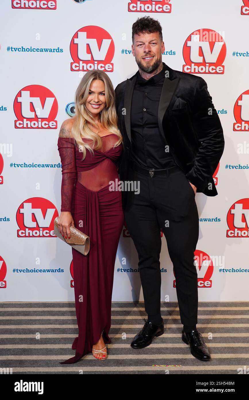 Jamie Christian (right), known as the Giant, from Gladiators attends ...