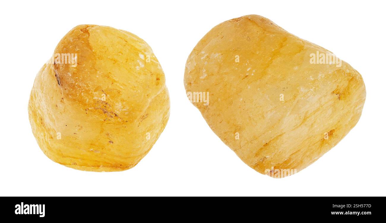 various specimens of uncut yellow sapphire rocks cutout on white ...