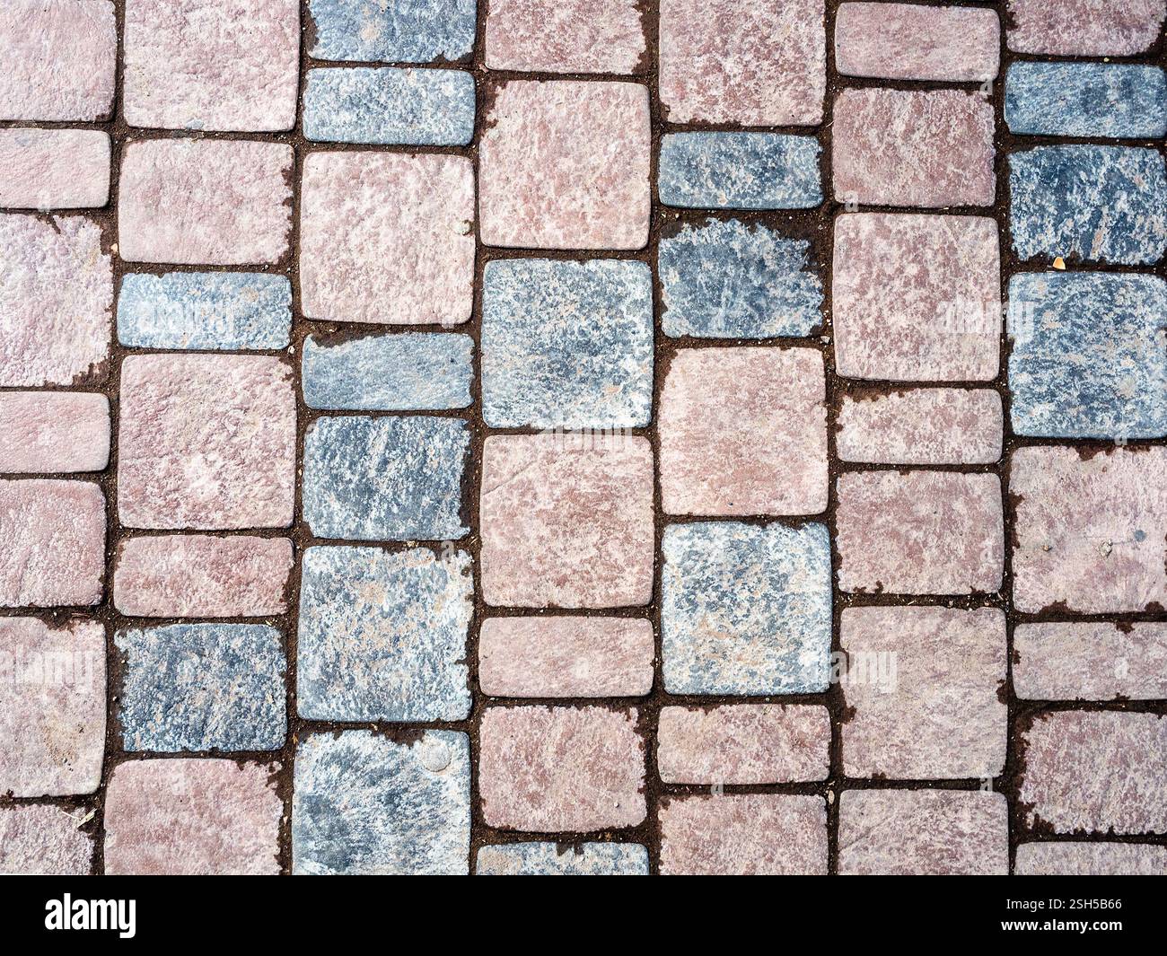 textured background - brown and gray stone tiles on path surface Stock ...