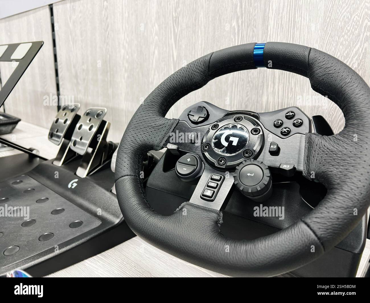 Kyiv, Ukraine - February 09, 2025: A sturdy racing simulator Logitech ...