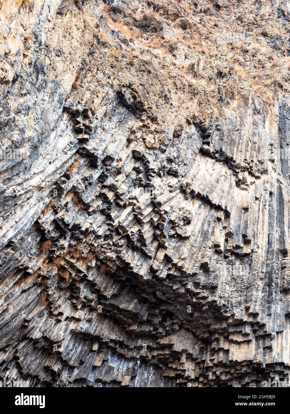 surface of wall in Garni Gorge from natural basalt columns in Symphony ...