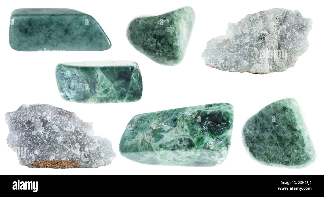 various specimens of uncut jadeite rocks cutout on white background ...