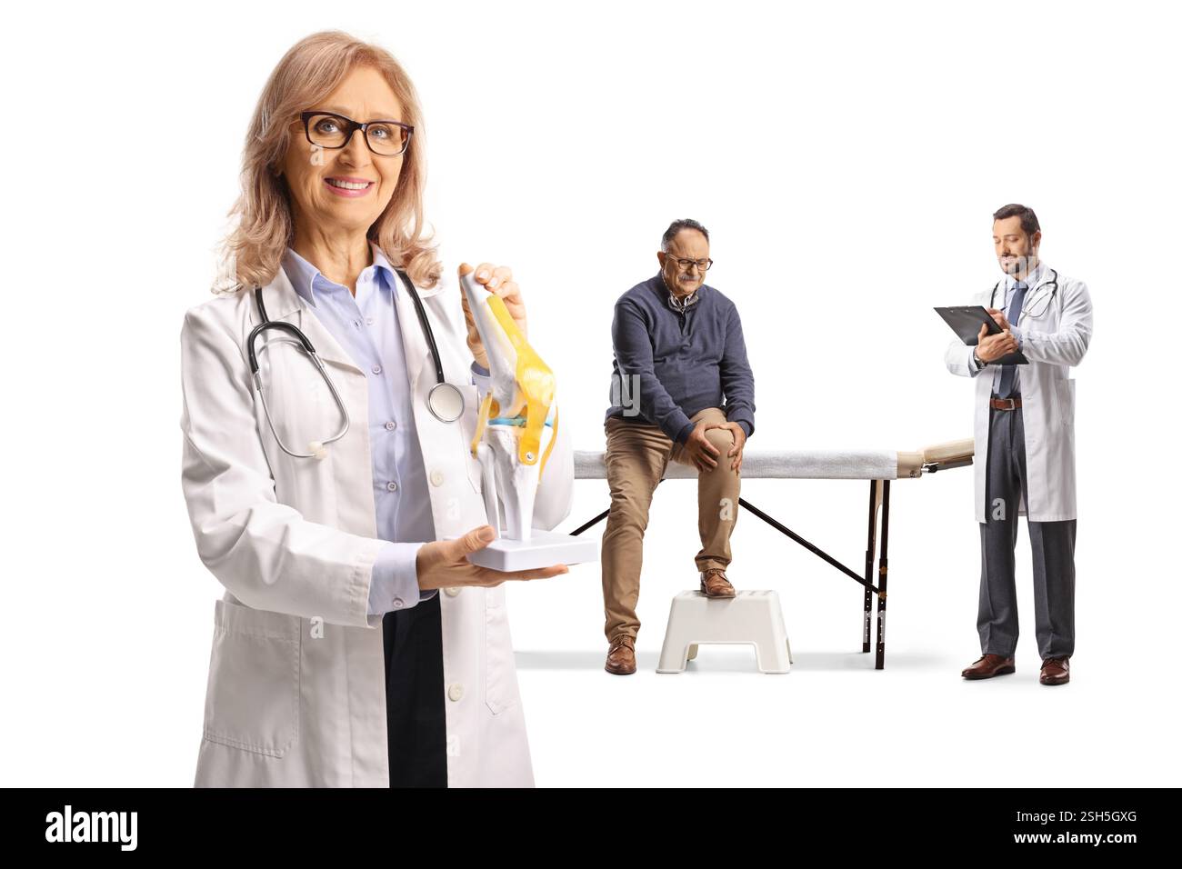 Doctor checking knee bone to a mature male patient isolated on white ...