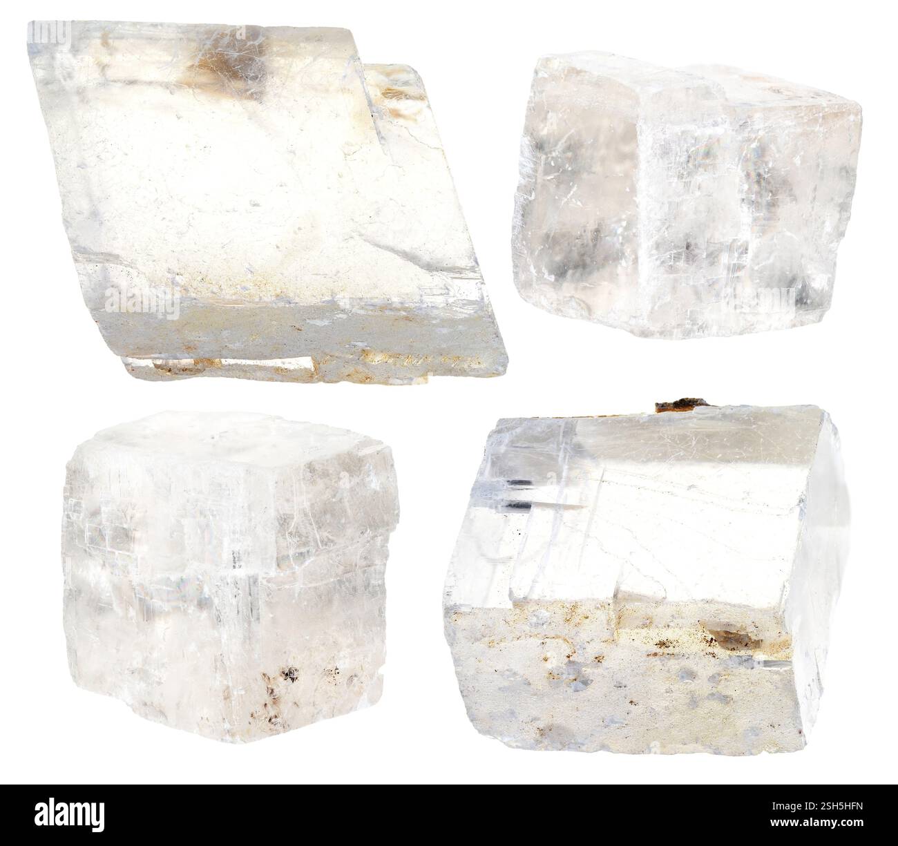 various specimens of uncut iceland spar rocks cutout on white ...