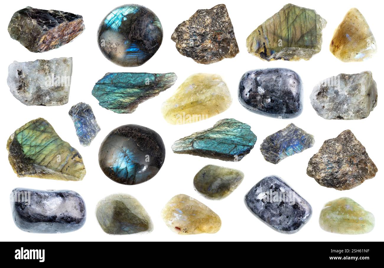 various specimens of uncut labradorite rocks cutout on white background ...