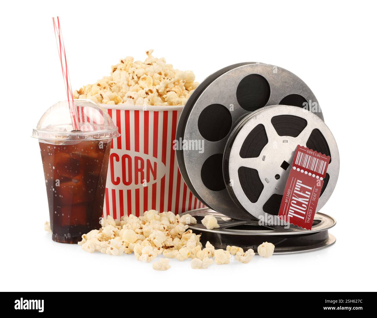 Tasty popcorn, film reels, soda drink and movie ticket isolated on ...