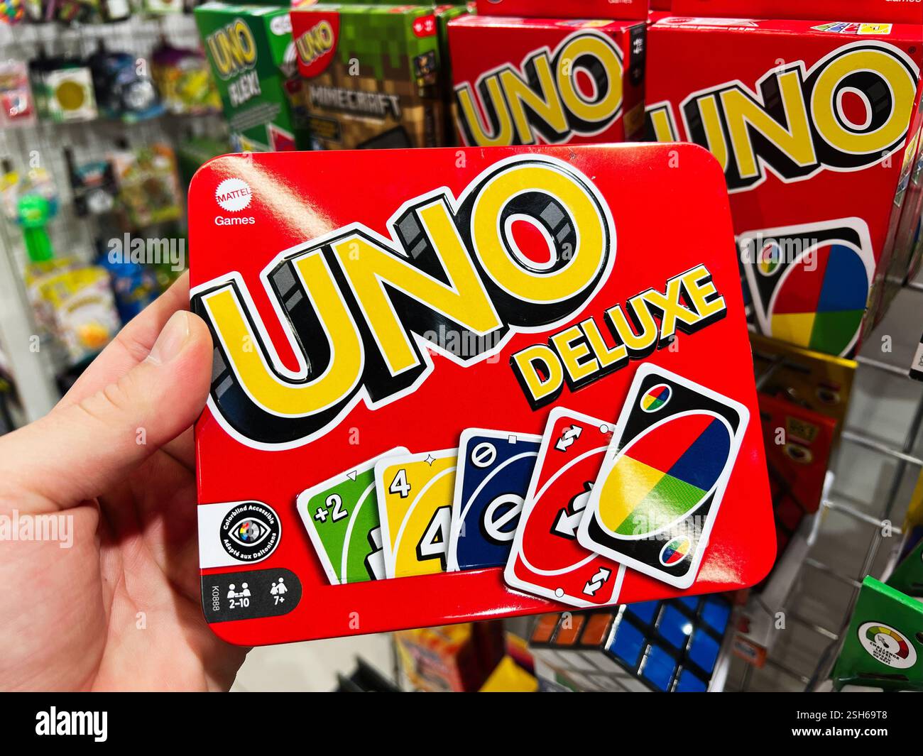 Kyiv, Ukraine - February 09, 2025: Colorful close-up of UNO Deluxe game ...