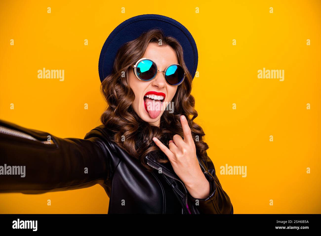 Close up photo of cheerful girl blogger influencer on rock-and-roll ...