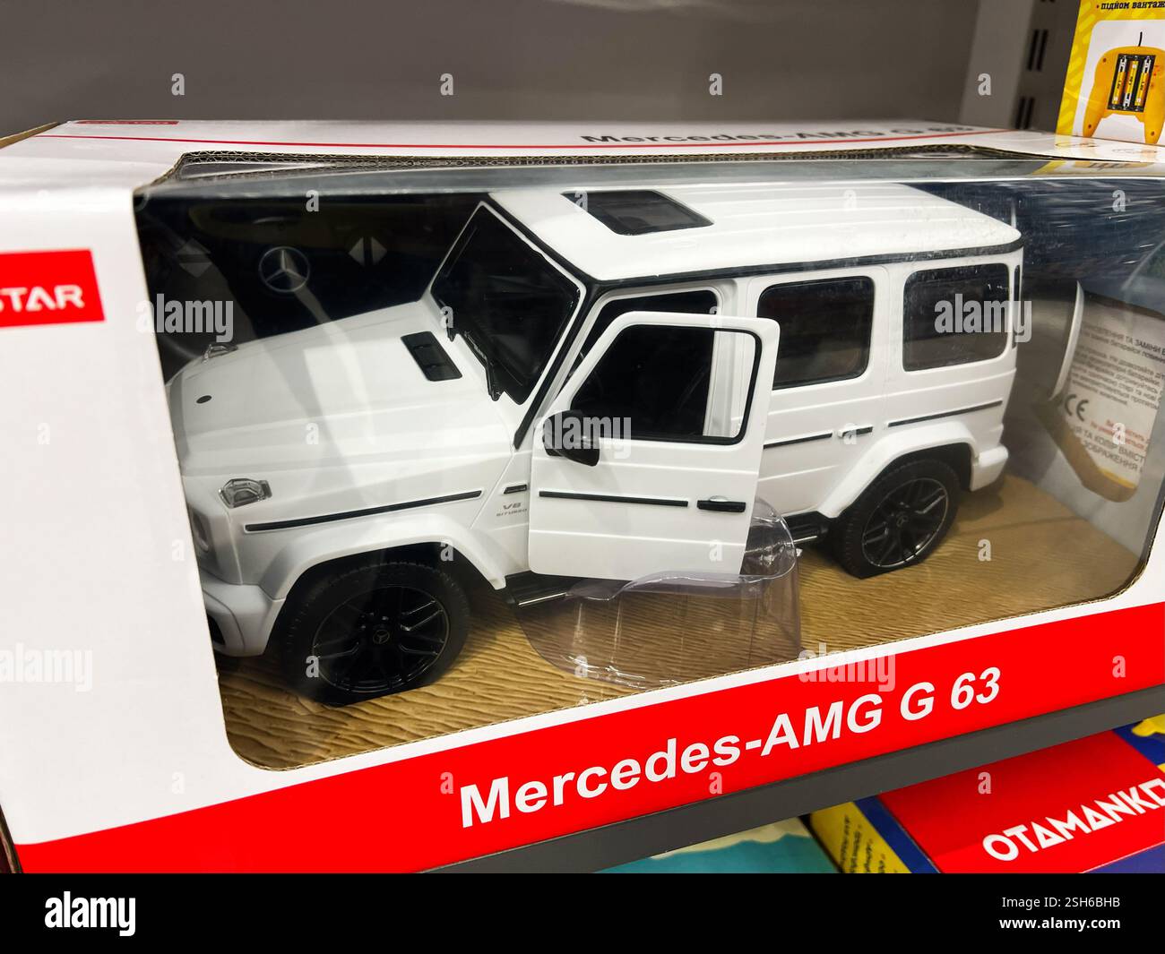 Kyiv, Ukraine - February 09, 2025: A white toy car model of a Mercedes ...