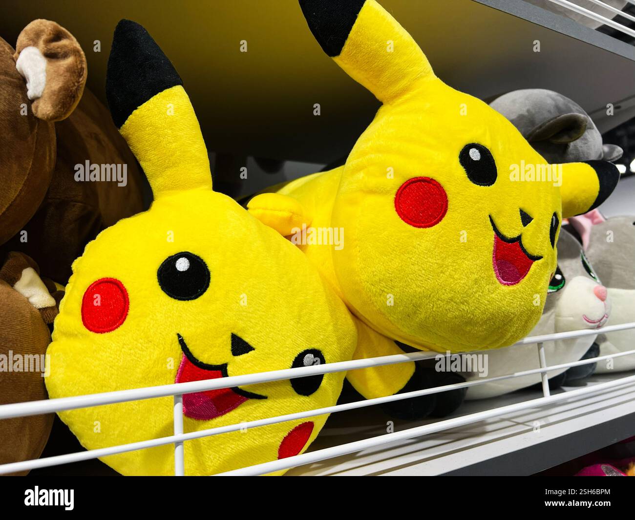 Kyiv, Ukraine - February 09, 2025: Bright yellow plush Pikachu toys ...