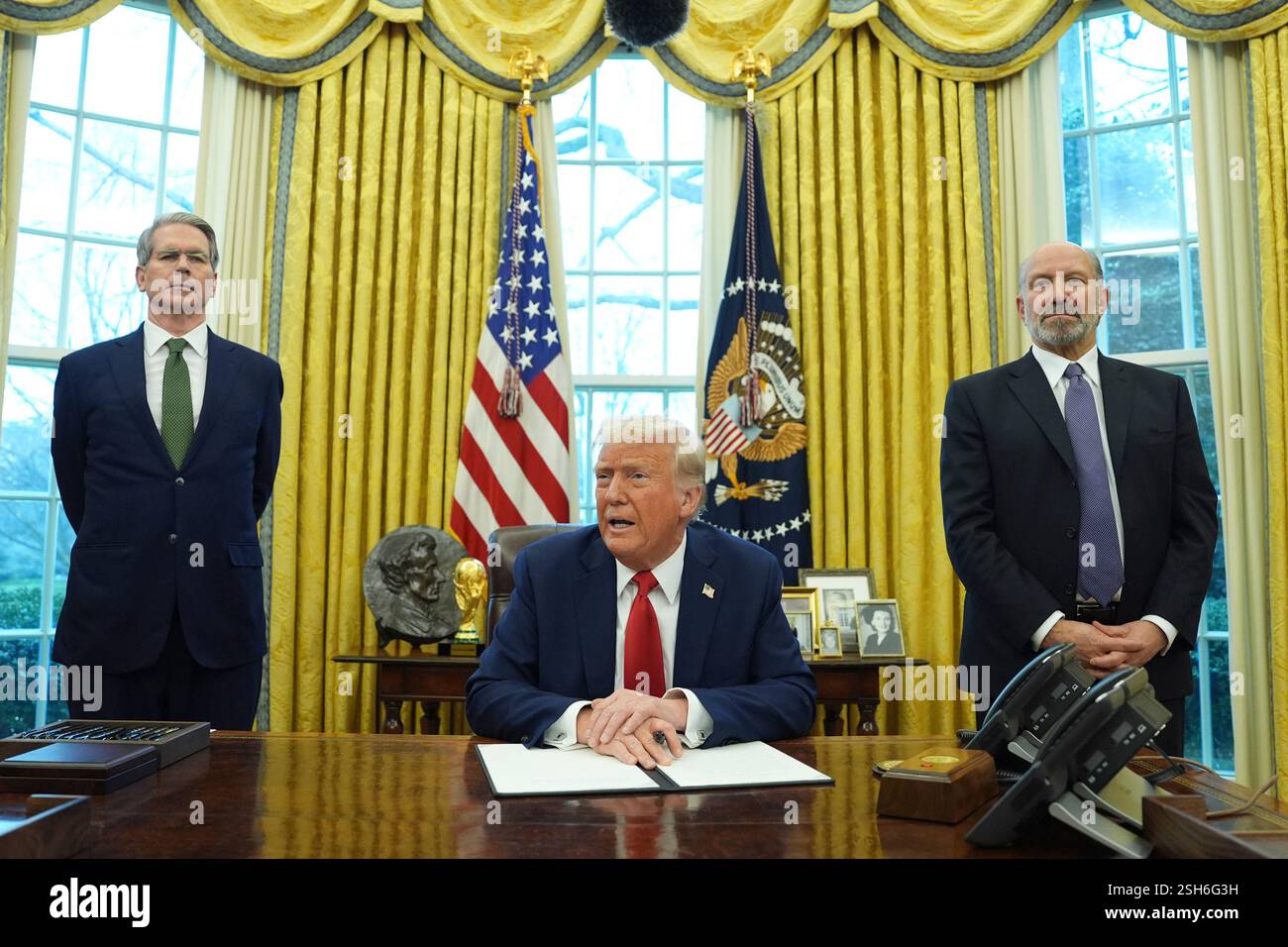 FILE - President Donald Trump speaks as Treasury Secretary Scott ...