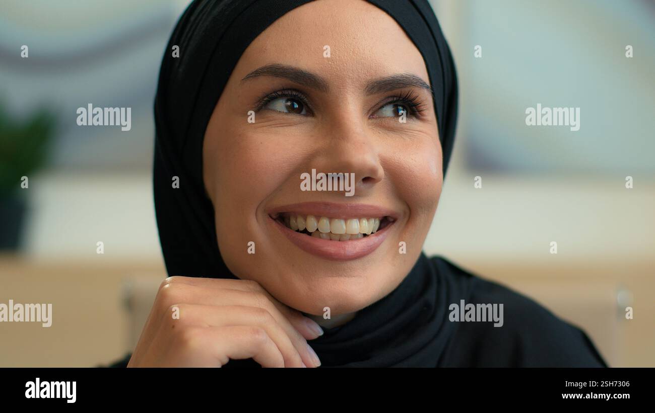 Close up portrait happy Arabian muslim Islamic woman in black hijab ...