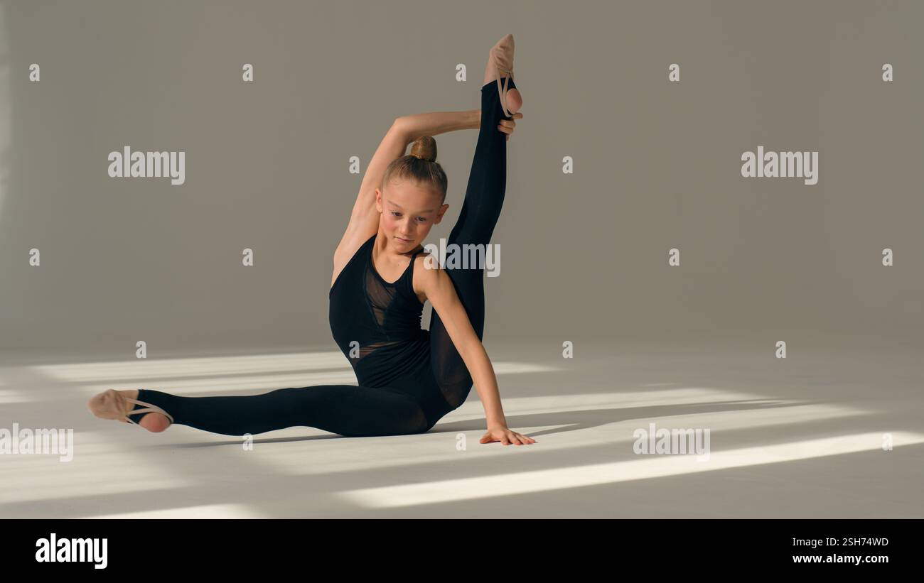 Caucasian sport girl little kid child daughter schoolgirl gymnast ...