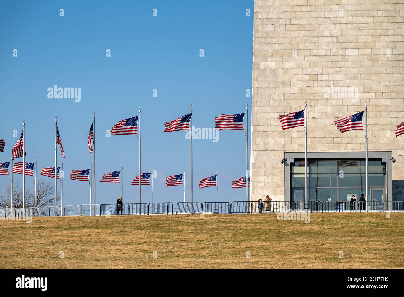 WASHINGTON DC — American flags encircle the base of the Washington ...