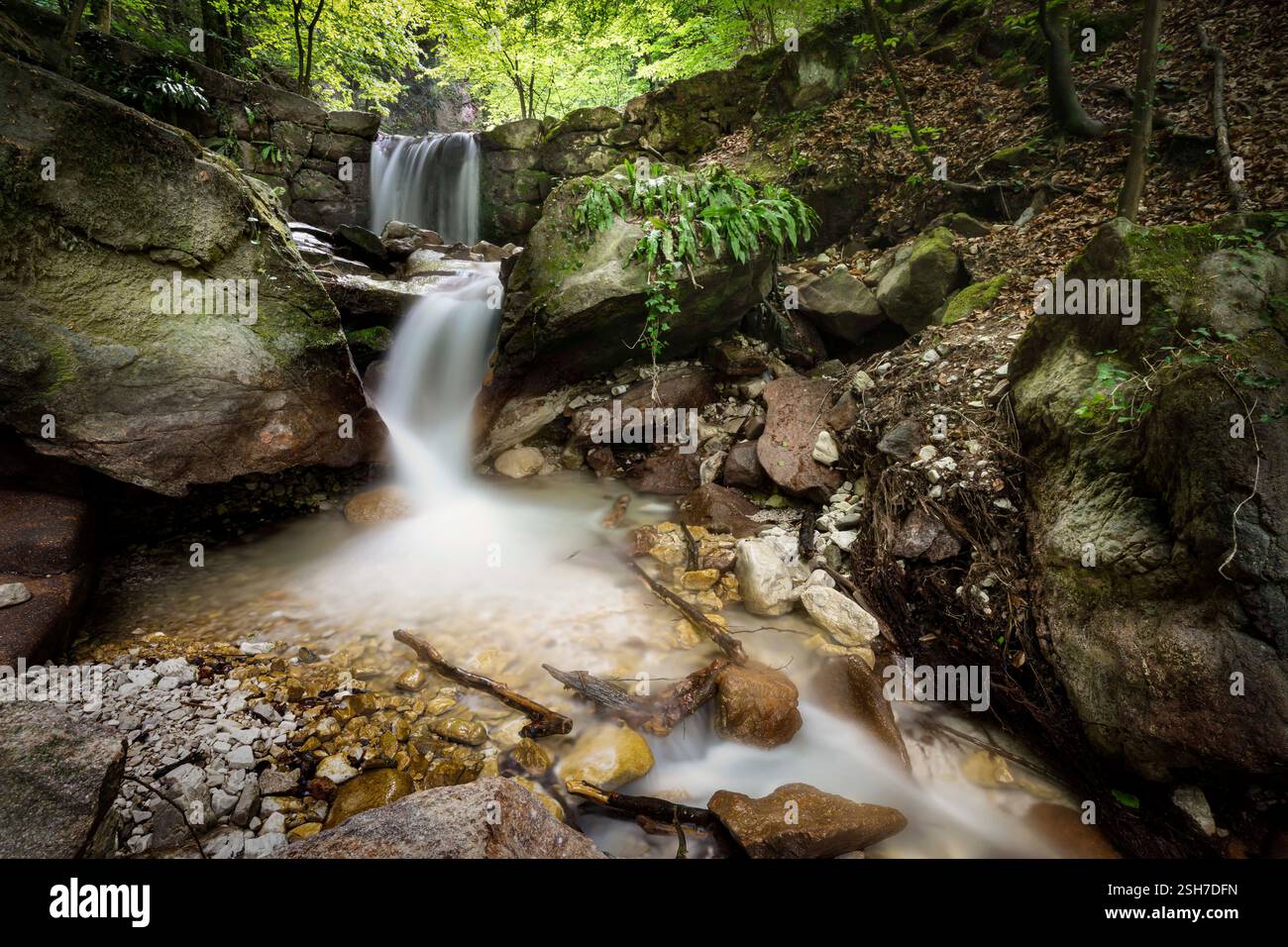 Long exposure photography of waterfall and small mountain stream Stock ...