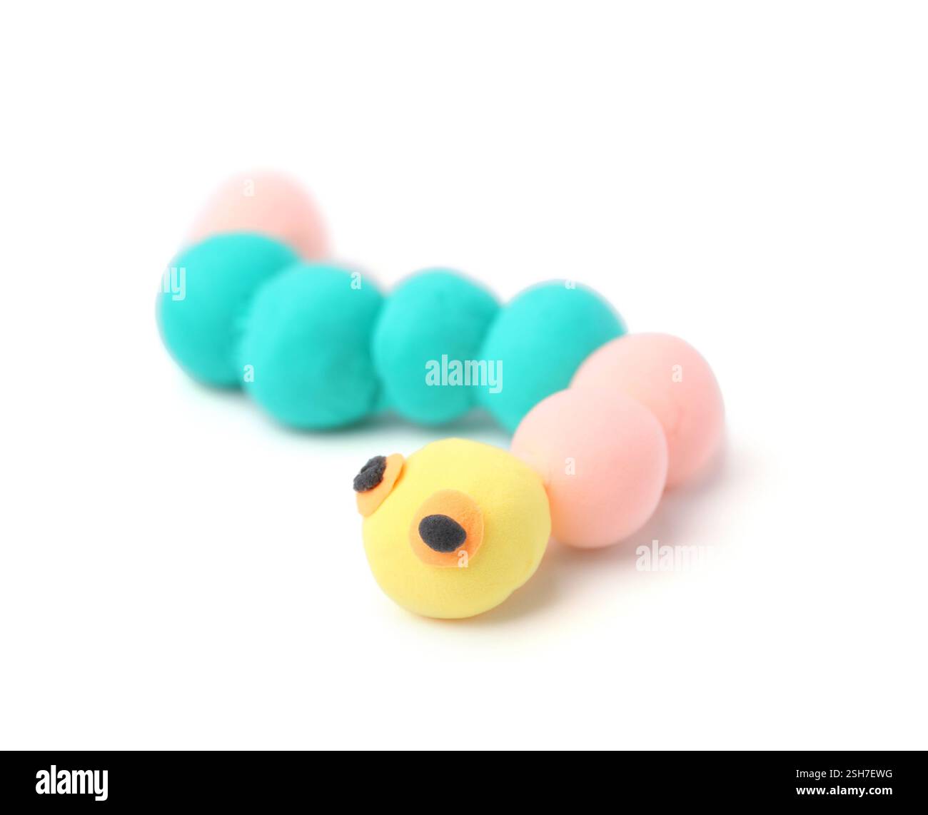 Caterpillar made from play dough isolated on white Stock Photo - Alamy