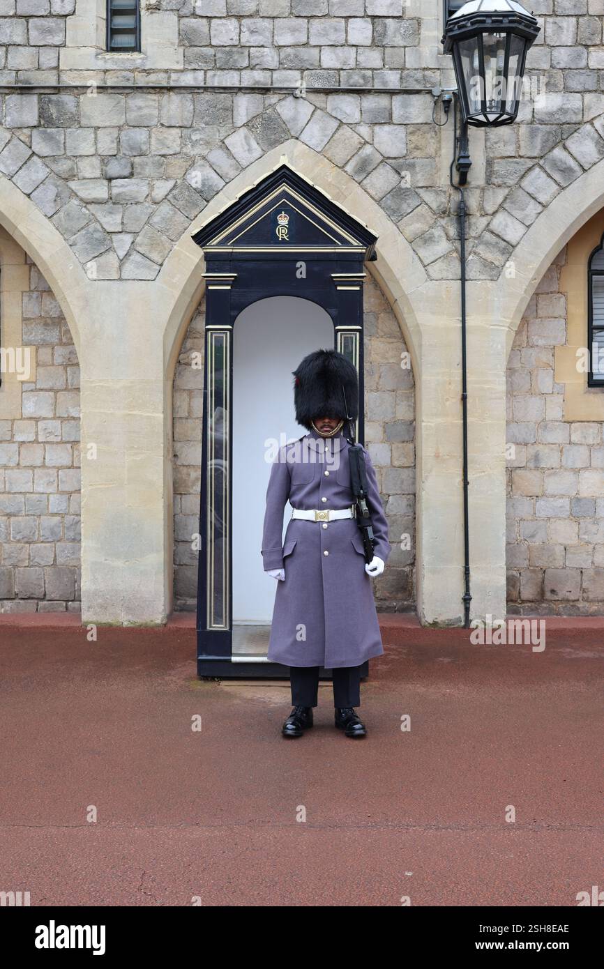 King's Guard standing on duty at Windsor Castle, England Stock Photo ...