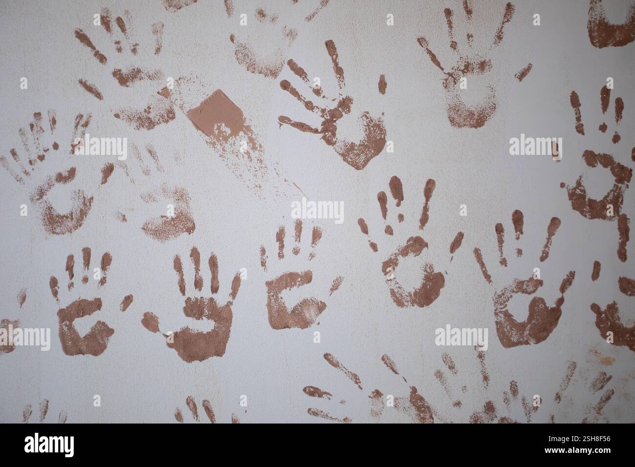 Ancient handprints can be seen on cave walls as unique forms of ...