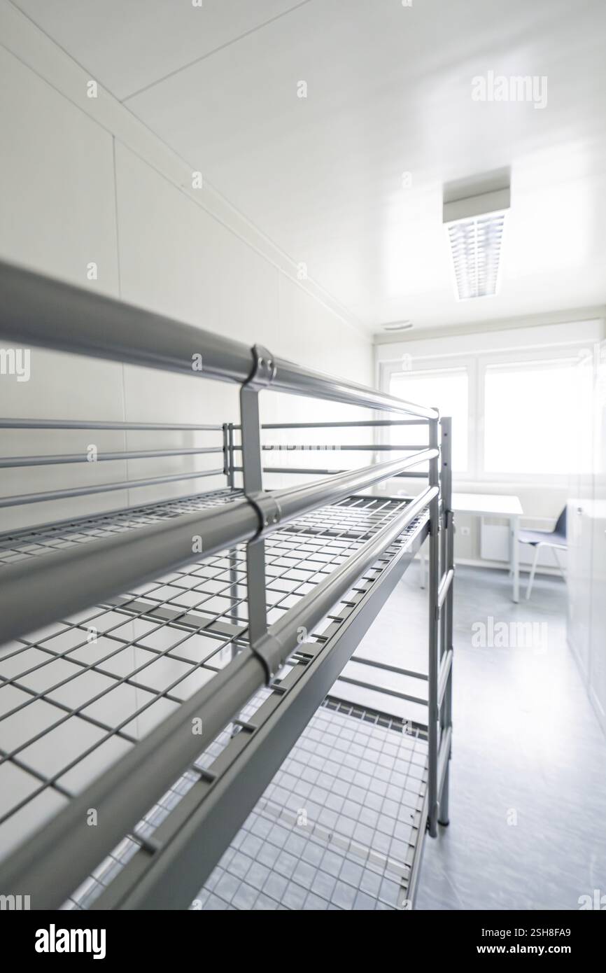 Simple room with a metal bunk bed and lots of natural light, Beermiss ...