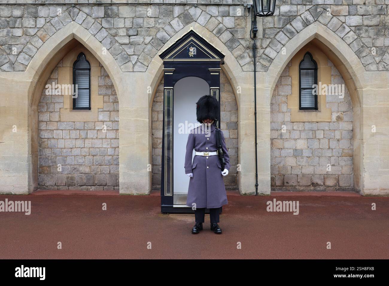 King's Guard standing on duty at Windsor Castle, England Stock Photo ...