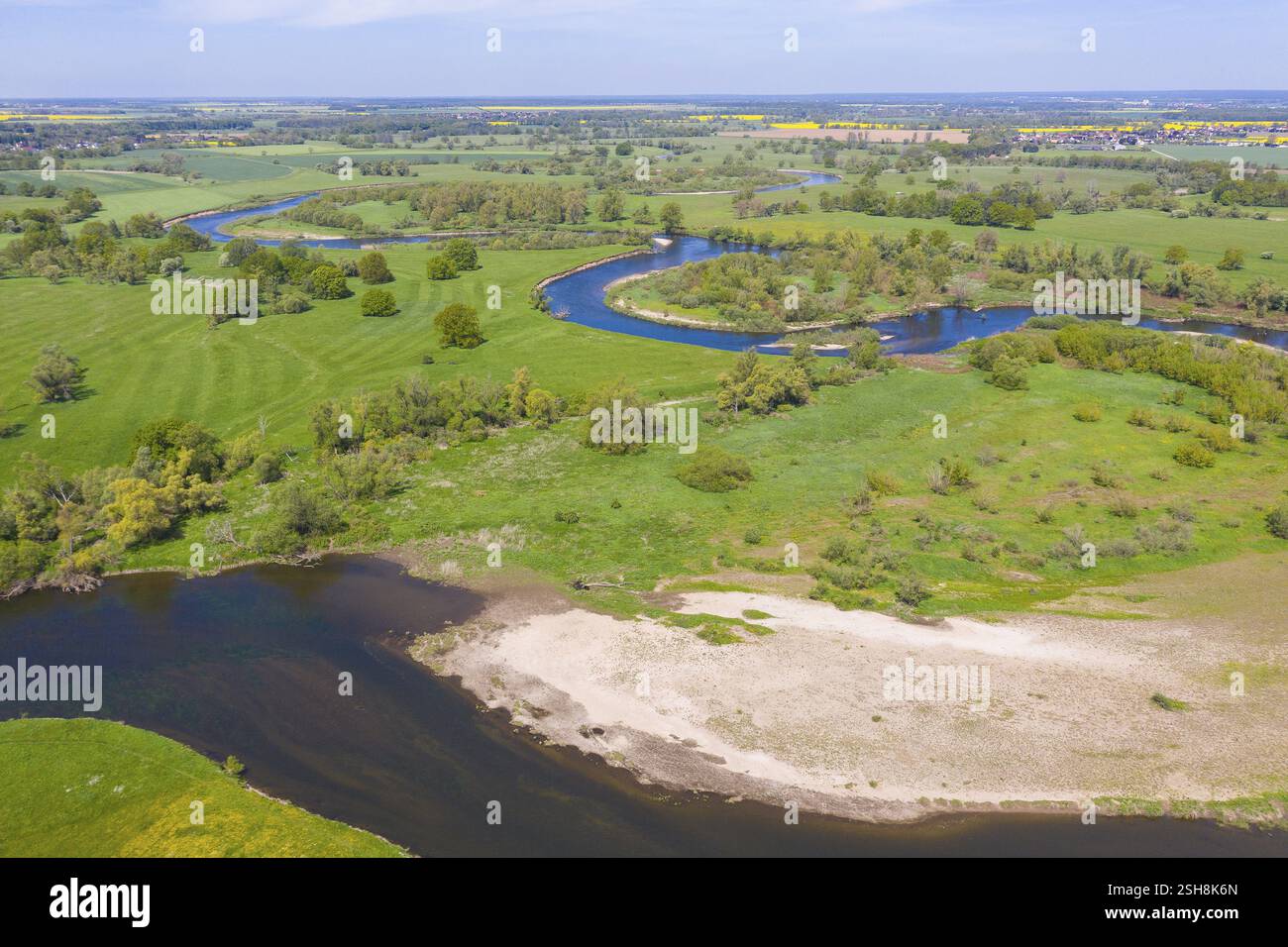 The Mulde river meanders through a series of bends in Eilenburg, Saxony ...