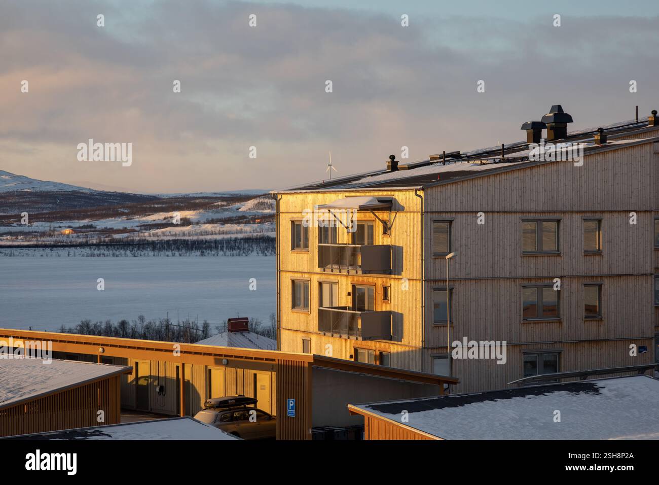 View of the new residential area by Luossavaara with low standing sun ...