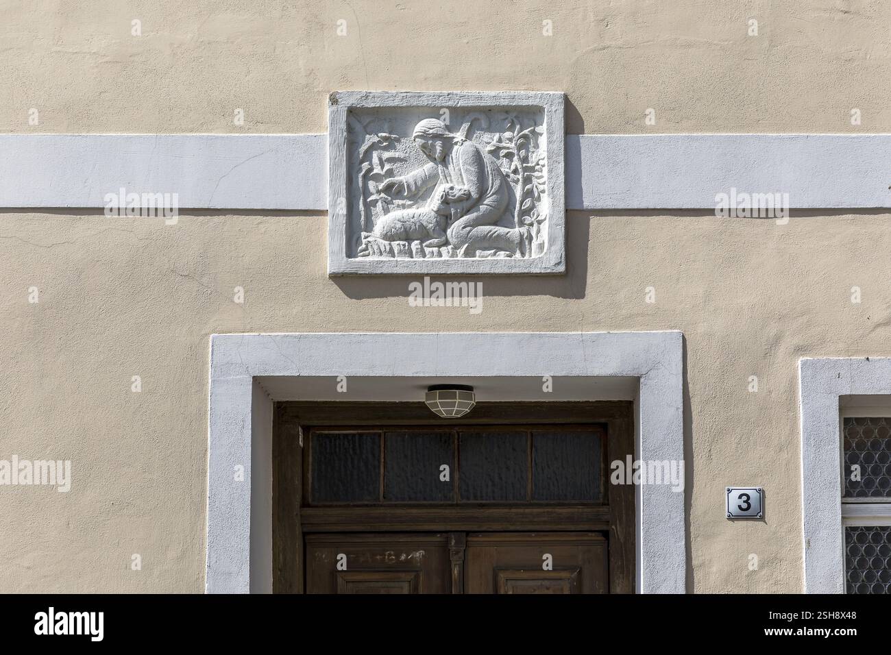 Relief painting of Christ as the good shepherd on the rectory opposite ...