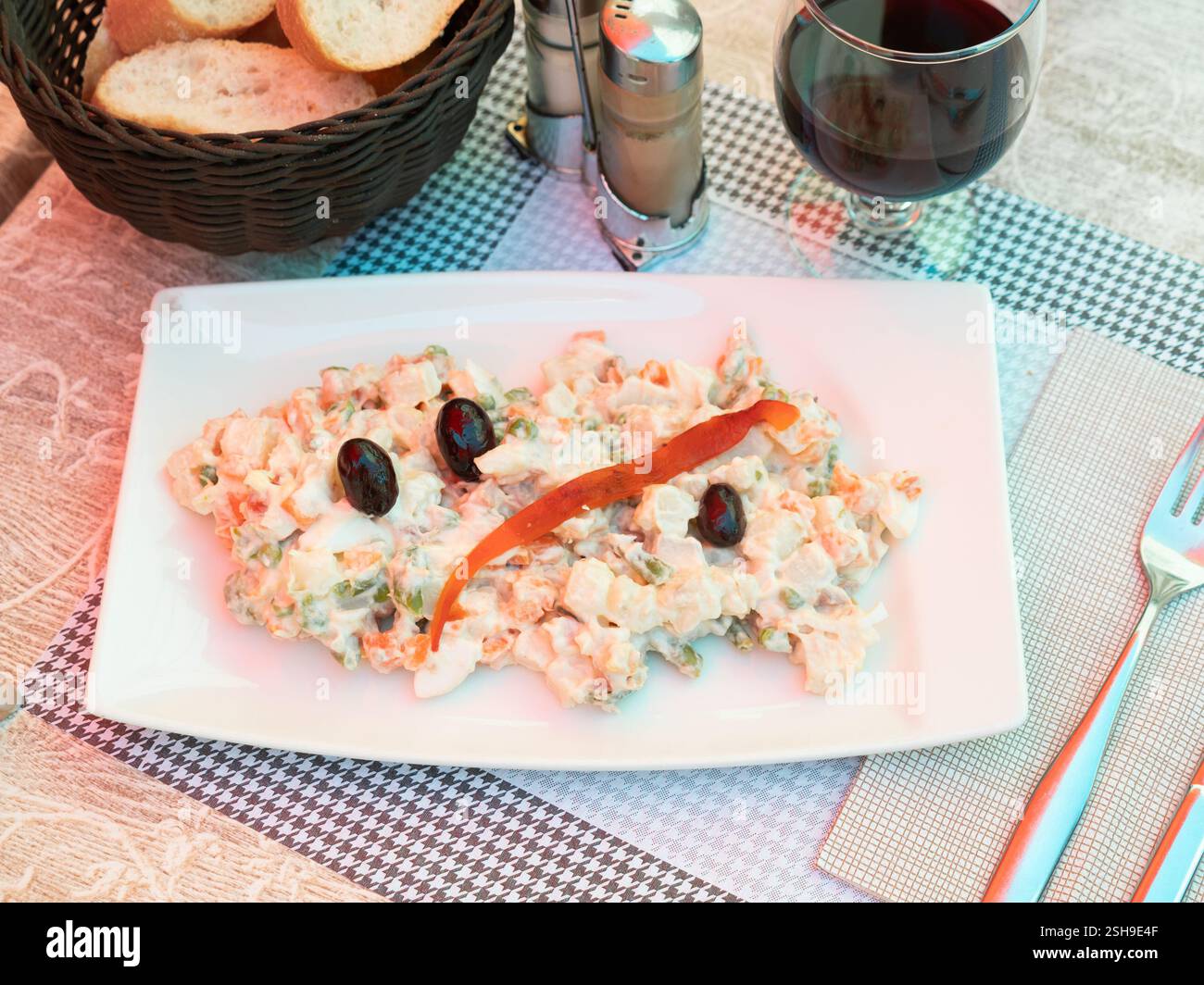 Traditional salad of Spanish cuisine called Ensalada rusa Stock Photo ...