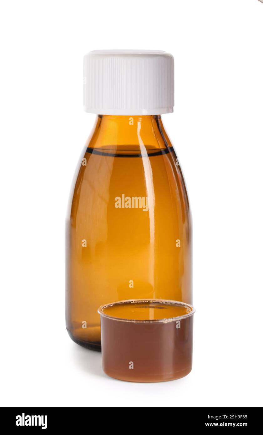 Bottle and measuring cup of cough syrup on white background Stock Photo ...