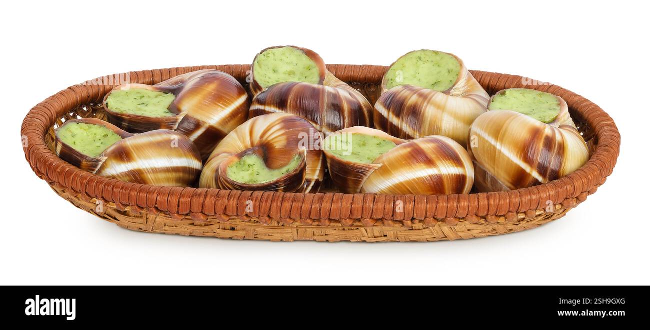 escargot snail filled with garlic and parsley butter in wicker basket ...