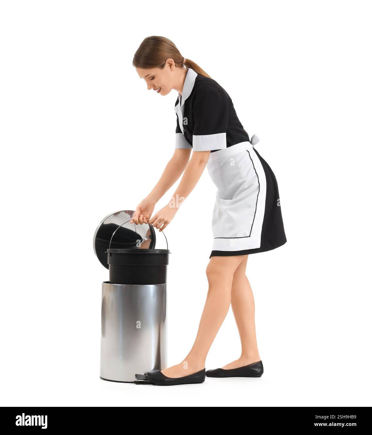 Pretty chambermaid with garbage bin on white background Stock Photo - Alamy