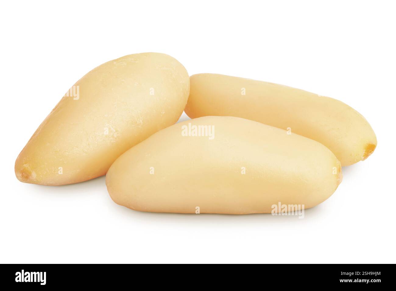 Shelled European pine nuts isolated on white background with full depth ...