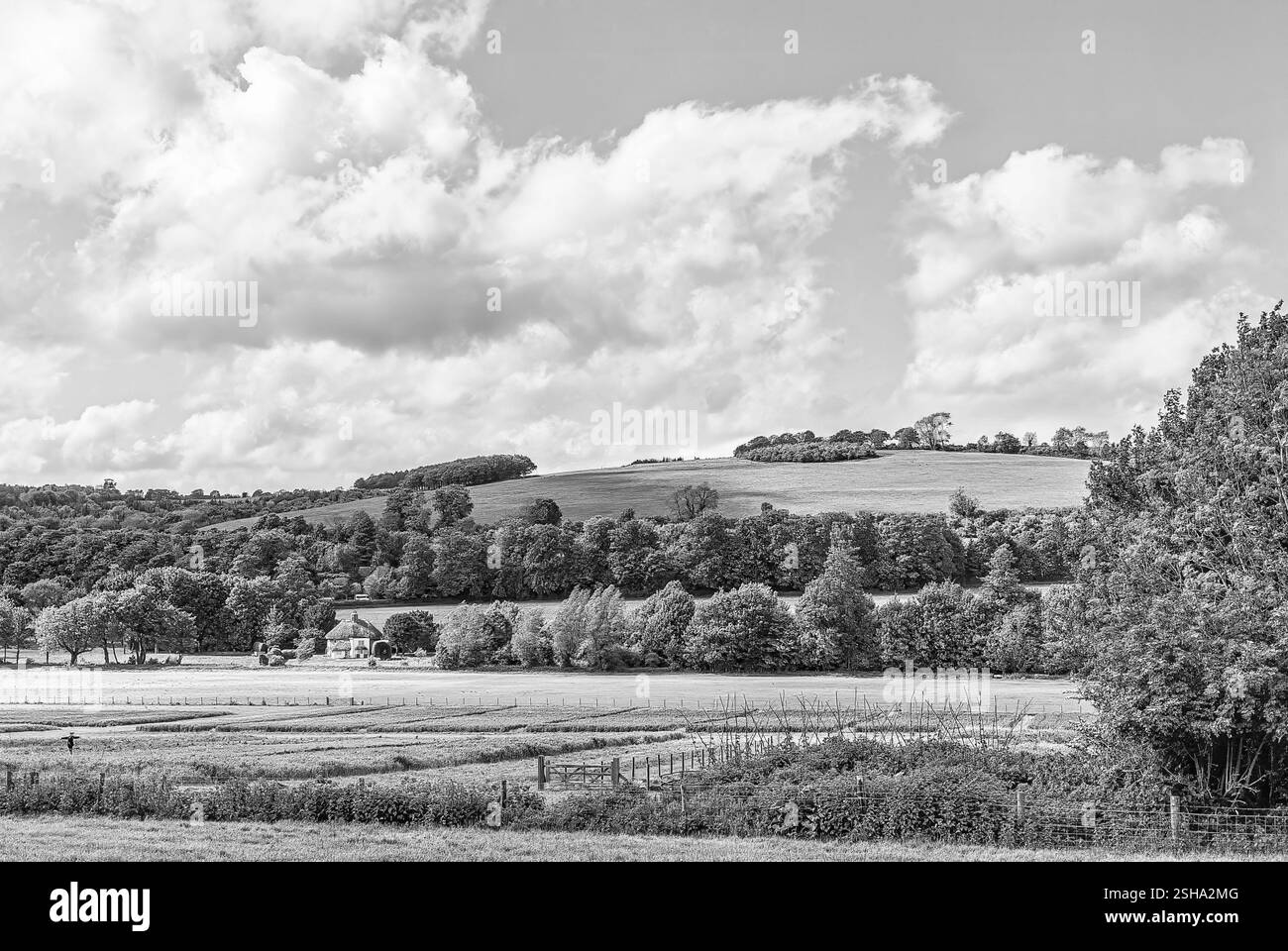 Black white image of a historic English Farmhouse at the Weald ...