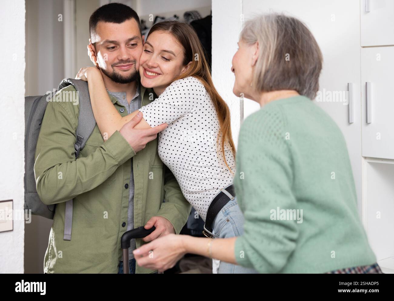 Son welcoming senior man hi-res stock photography and images - Alamy