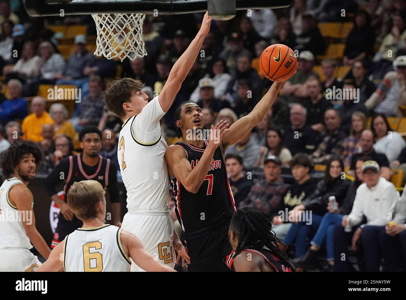 Houston guard Milos Uzan (7) and Colorado forward Sebastian Rancik (7 ...
