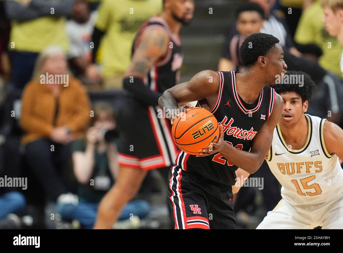 Houston guard Terrance Arceneaux (23) and Colorado guard Felix Kossaras ...