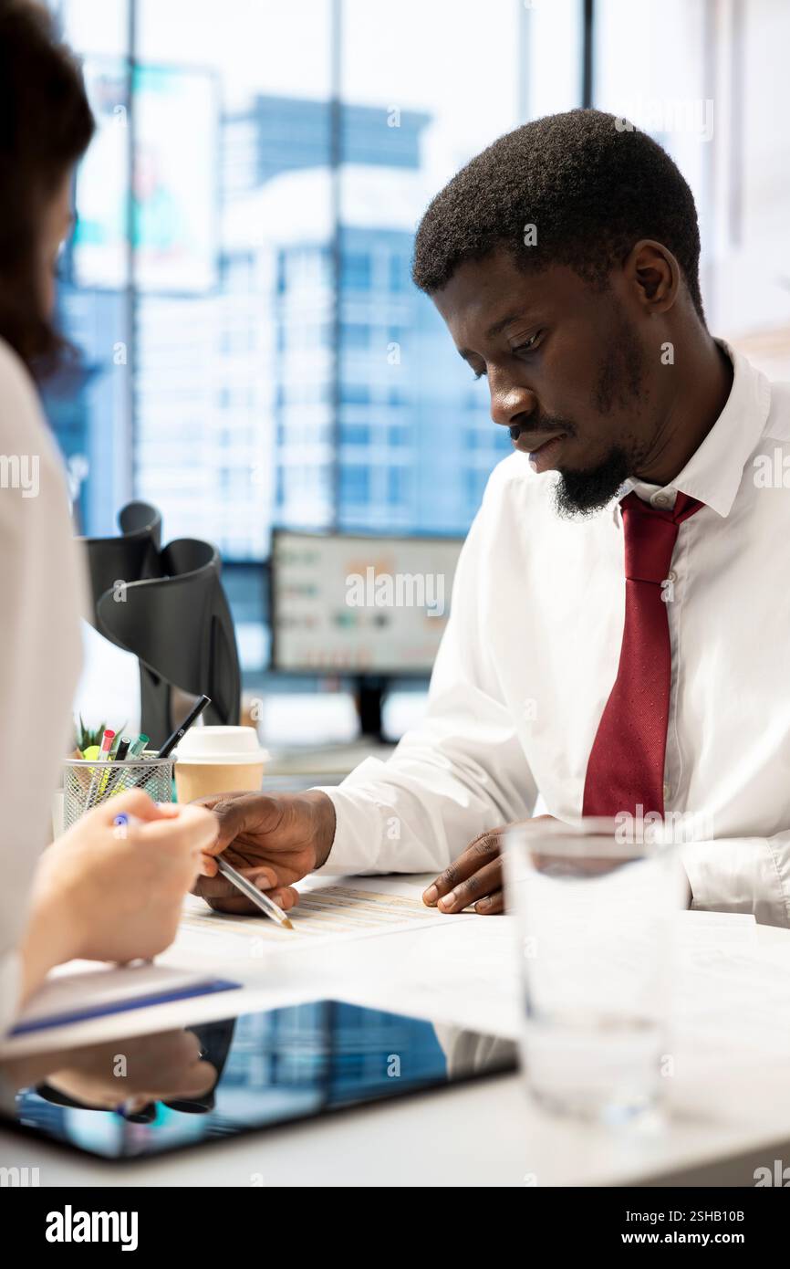 HR worker negotiating job offers and salary packages with african ...