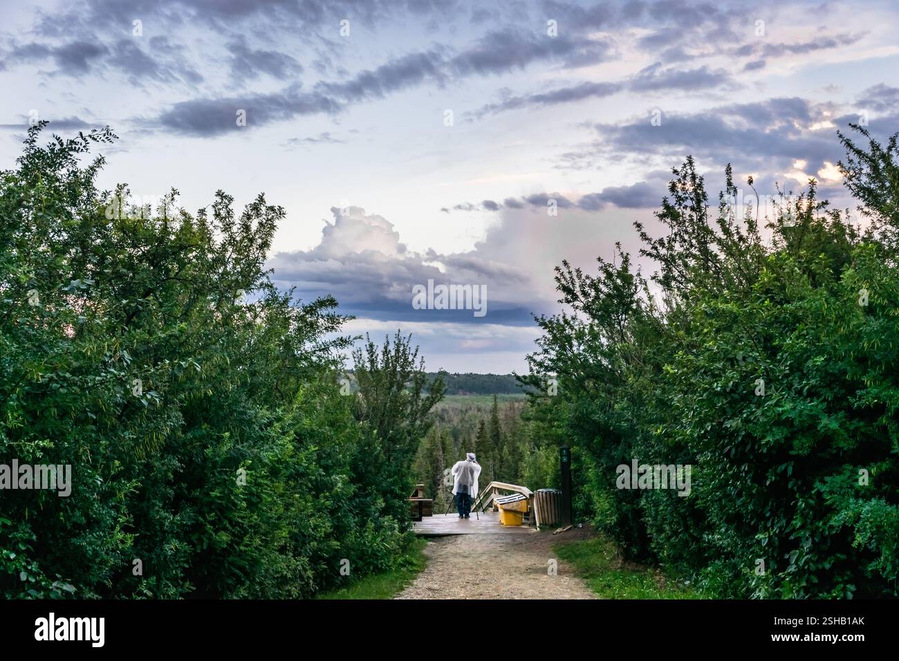 Single photographer shooting sunset eastern sky in rainy evening Stock ...