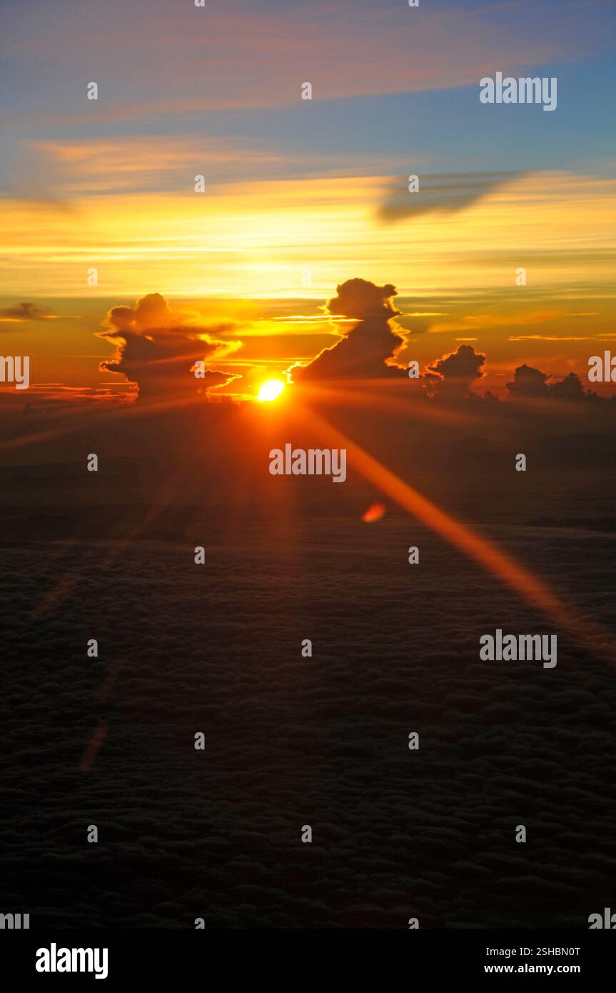 A view from an air passenger’s aircraft window of the first light of ...