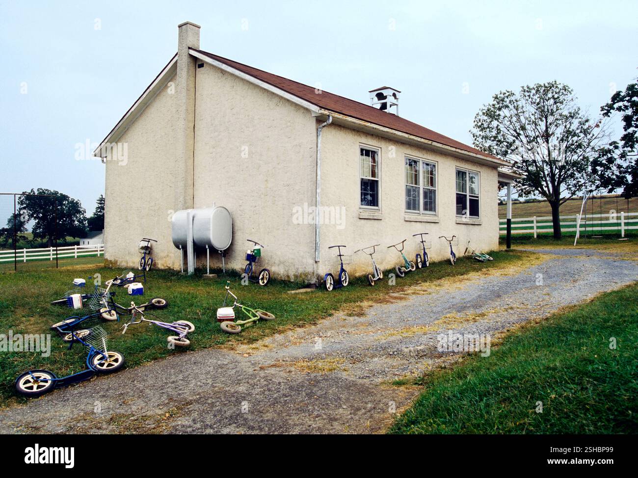 Amish children ride scooters to their rural schoolhouse; Lancaster ...