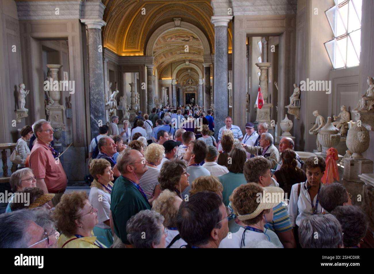 Guided tours of the Vatican museum can be rather crowded Stock Photo ...