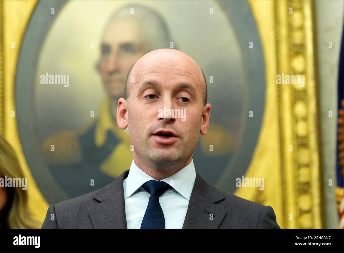 White House deputy chief of staff Stephen Miller watches as President ...