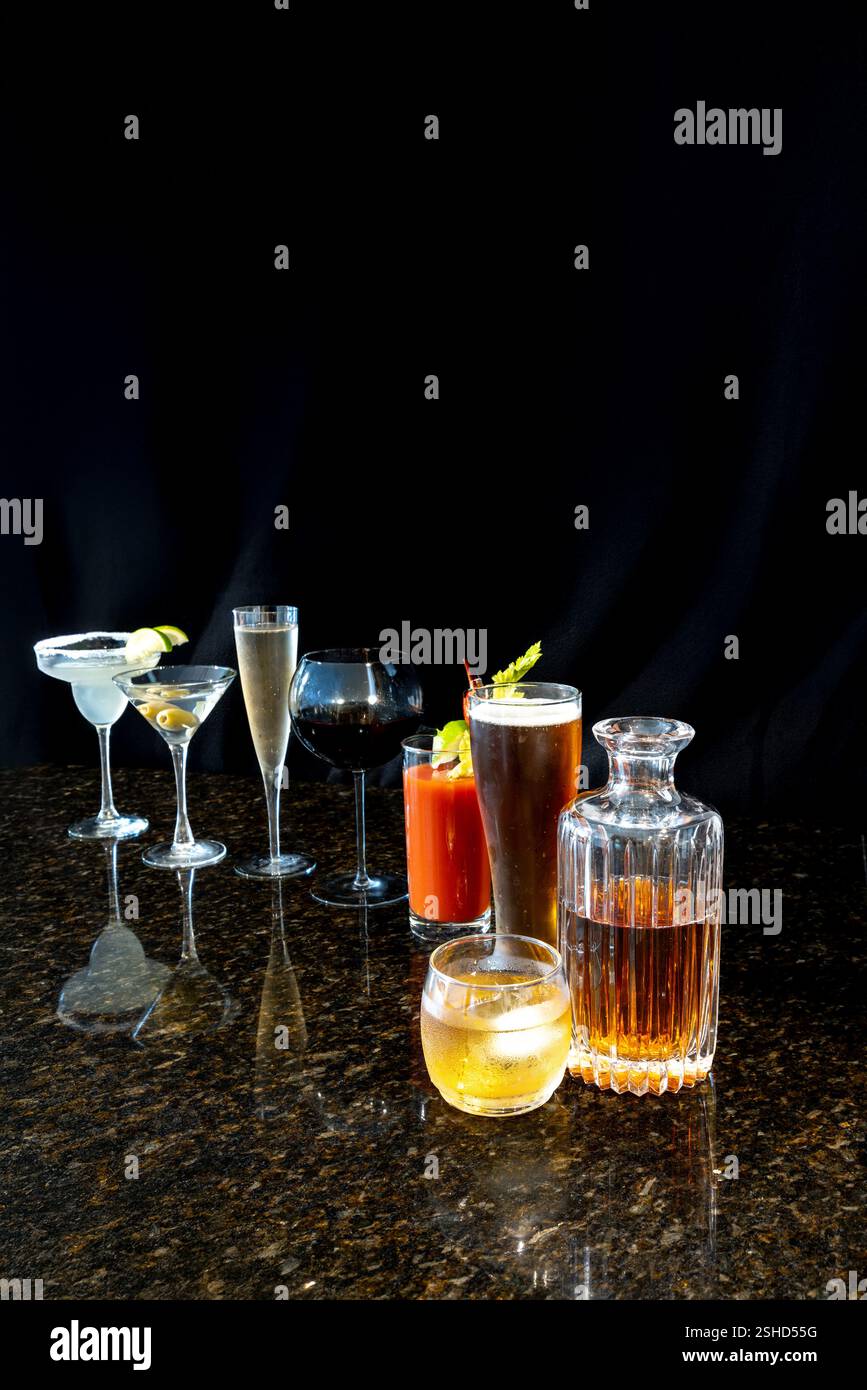 Large group of cocktails including a margarita, martini, champagne ...