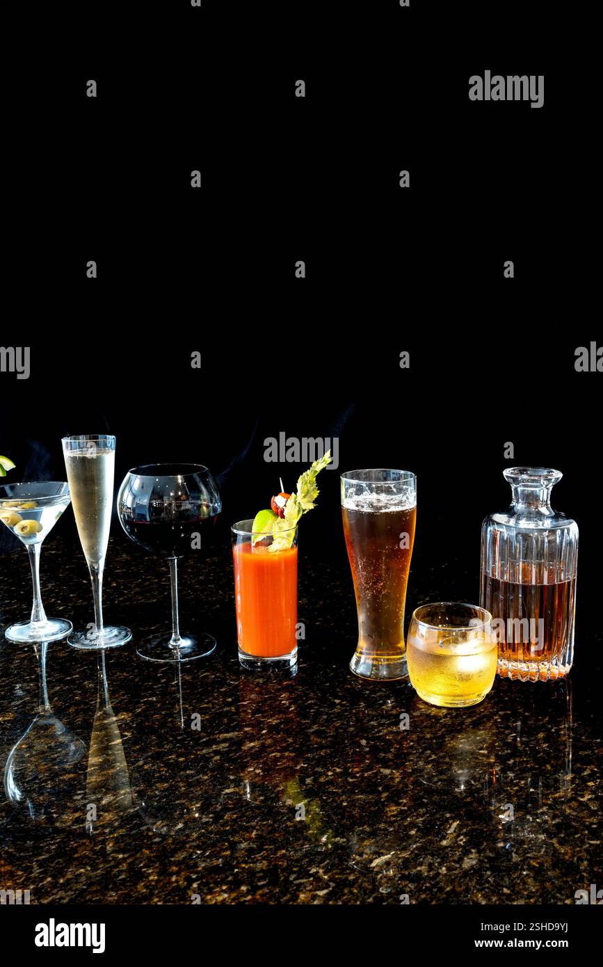 Large group of cocktails including a margarita, martini, champagne ...