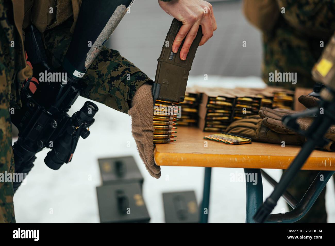 Marine loads ammunition magazine hi-res stock photography and images ...