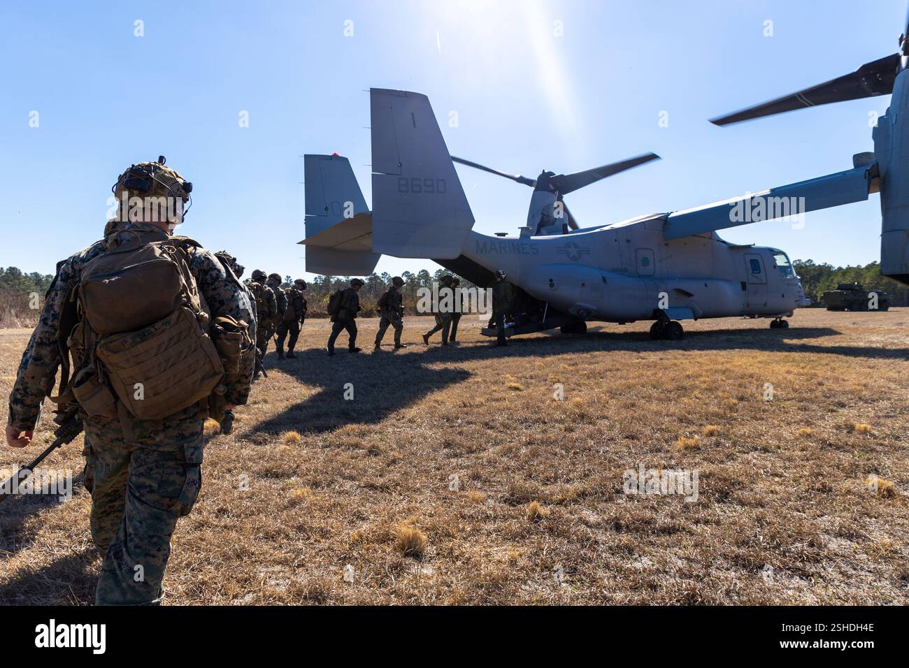 U.S. Marines with Golf Company, 2nd Battalion, 2nd Marine Regiment board an MV-22 Osprey ...
