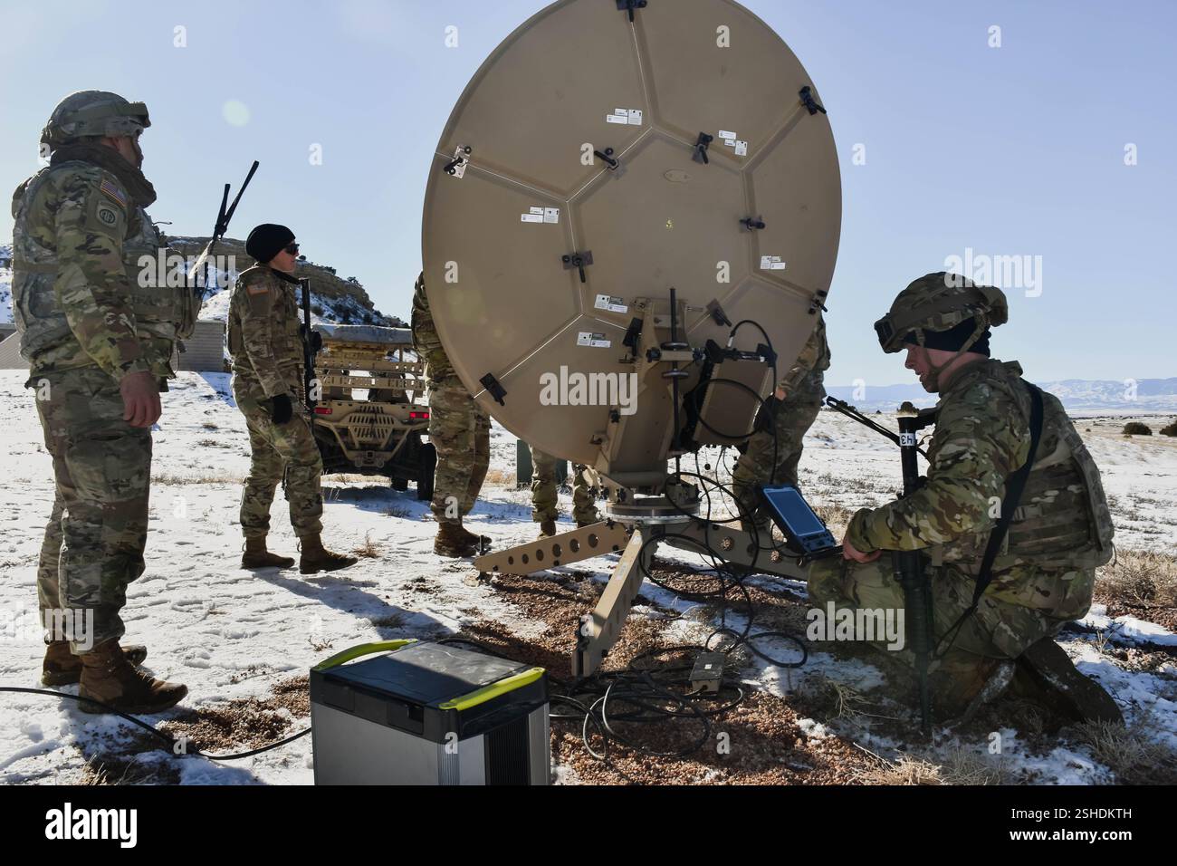 Soldiers with 18th Space Control Company, 1st Space Battalion, 1st Space Brigade construct an ...
