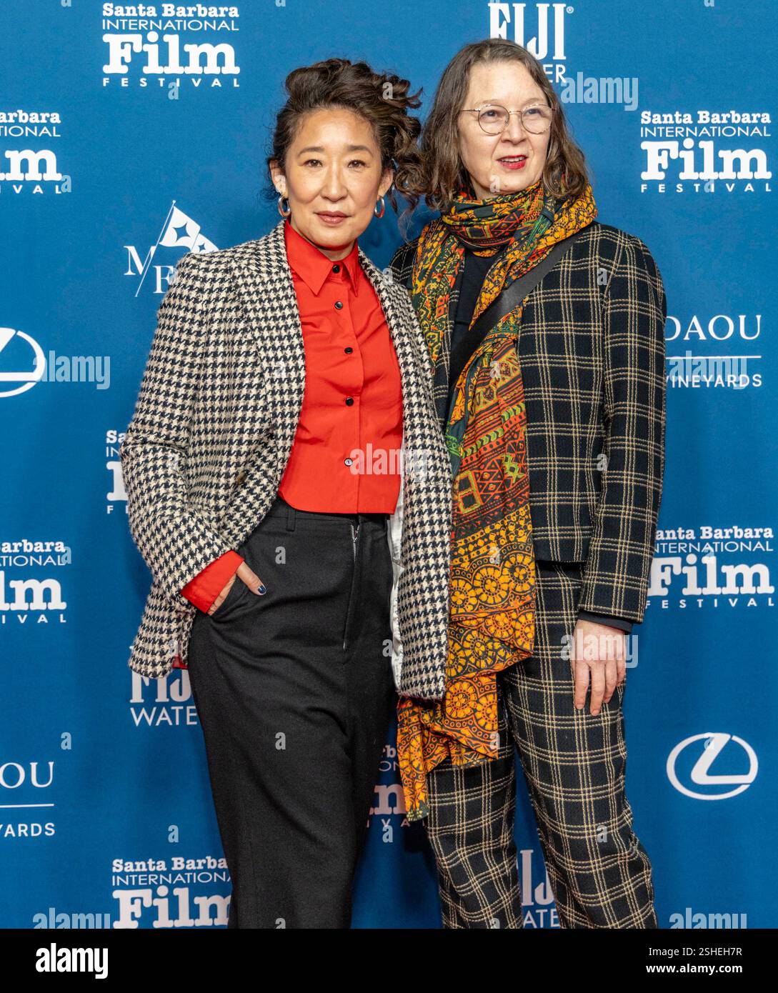 Red carpet arrivals Sandra Oh and Ann Marie Fleming (Can I Get A Witness). The 40th Santa ...
